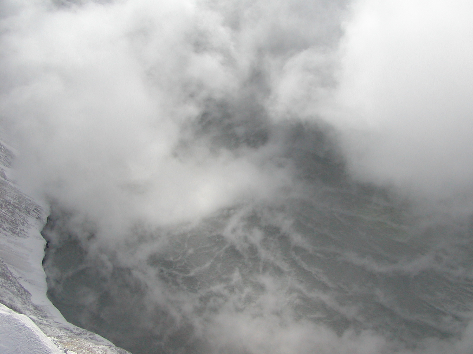 Steam and gas emanating from the crater lake at Chiginagak Volcano on ...