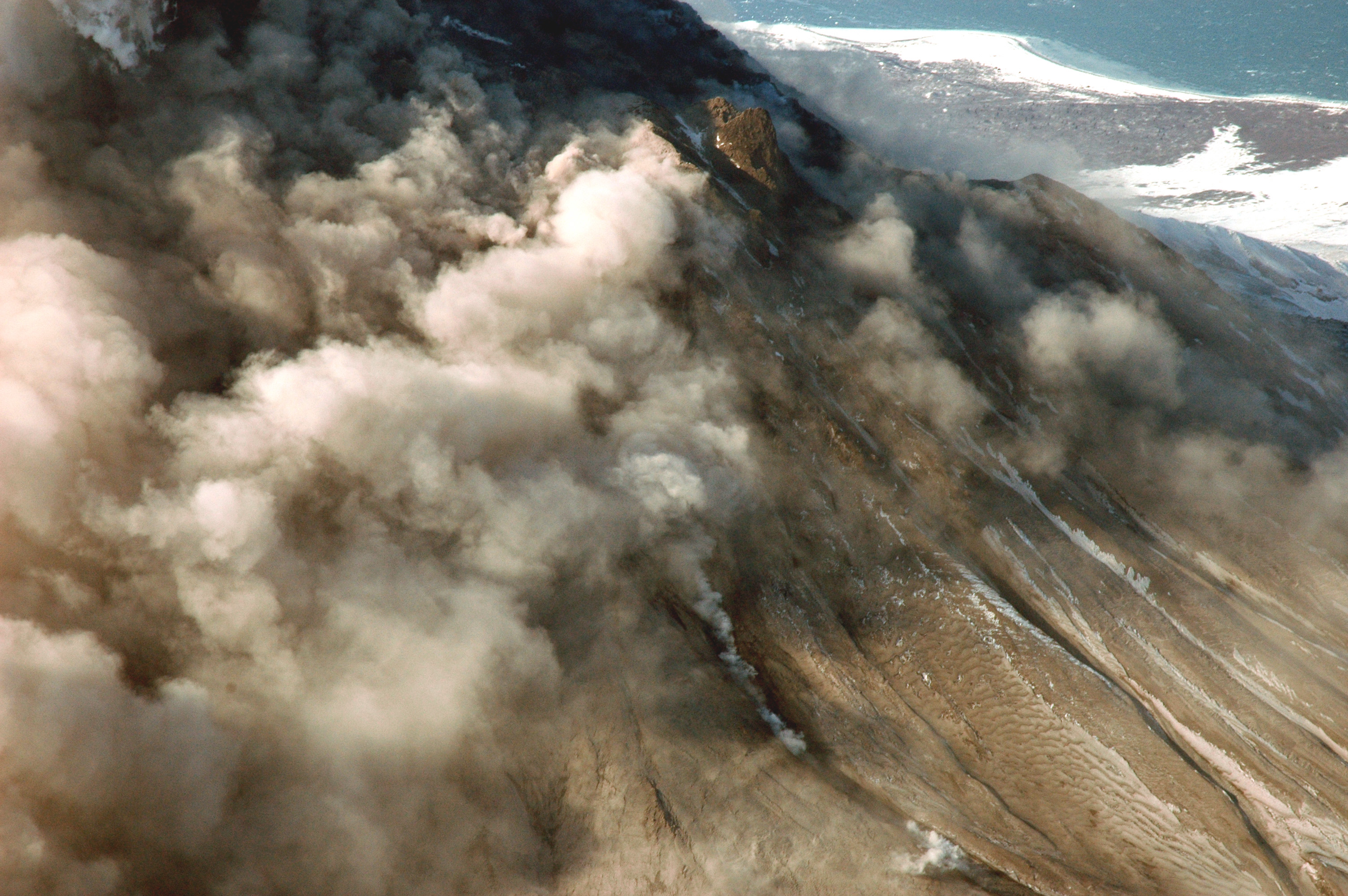 Small block-and-ash flow descending the northeast flank of Augustine ...