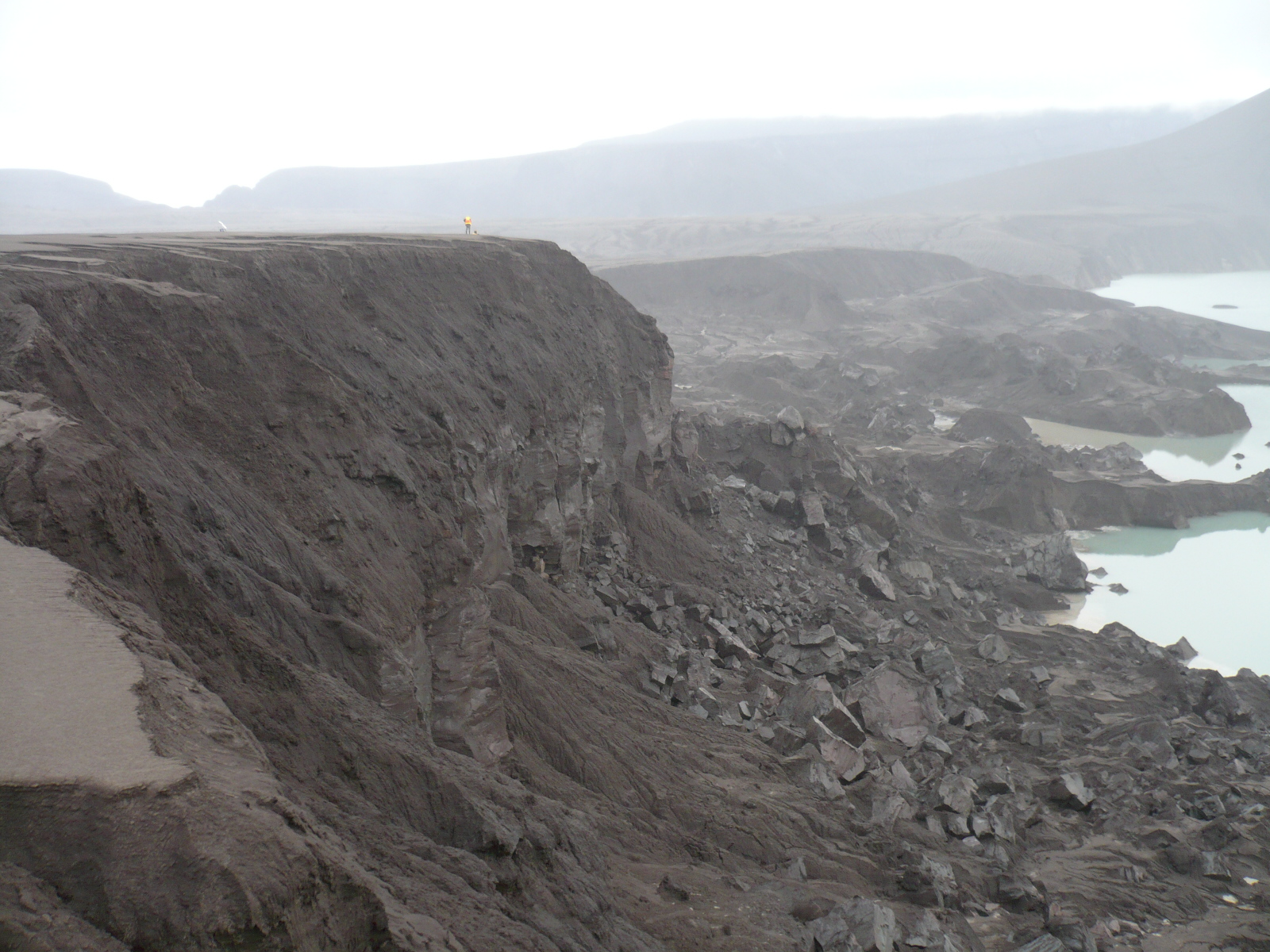 Jessica stands atop a cliff exposing about 4-6 m of fine grained 2008 ...