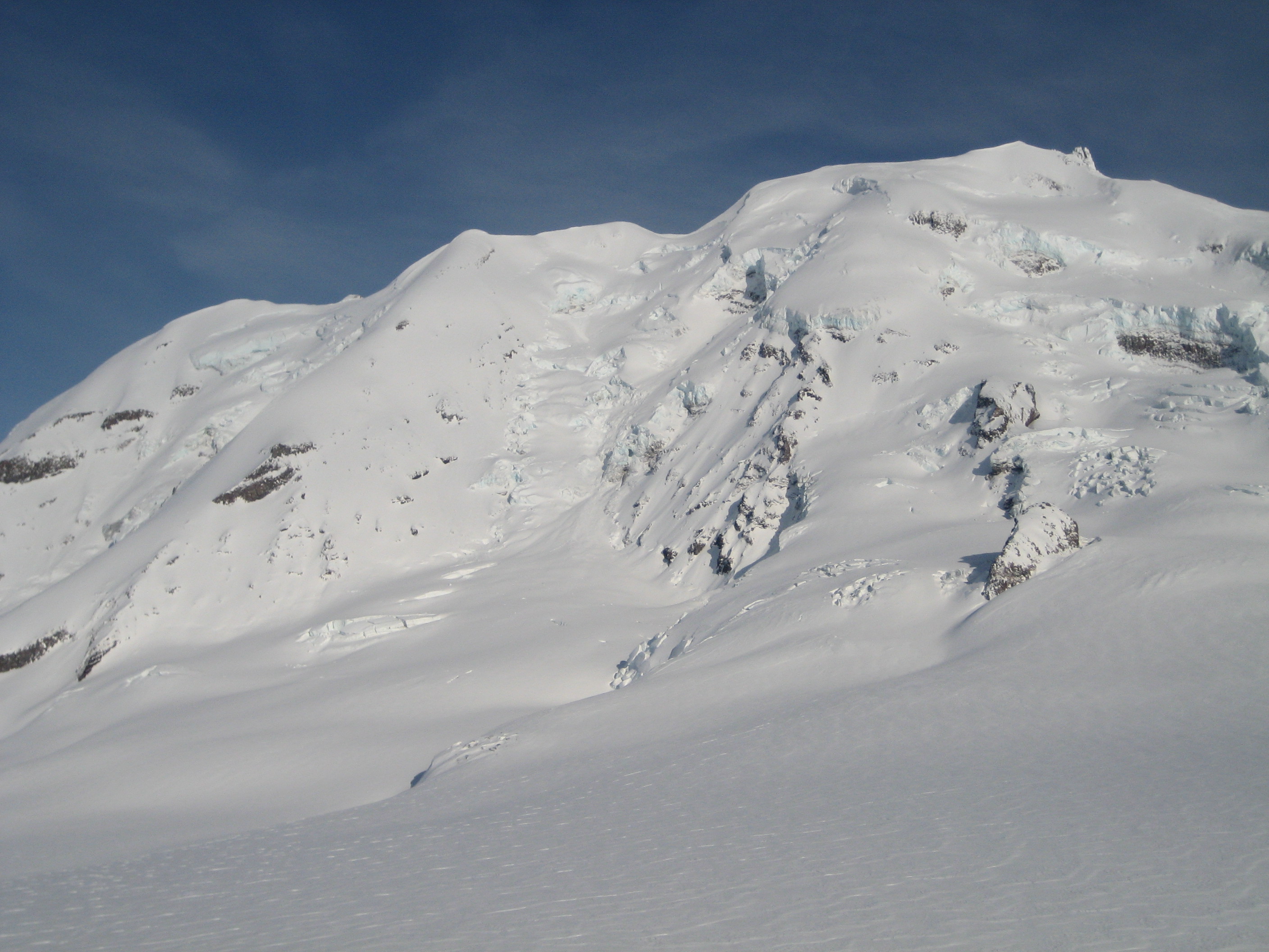 Image of the ice covered west side of Redoubt Volcano. Image taken less ...
