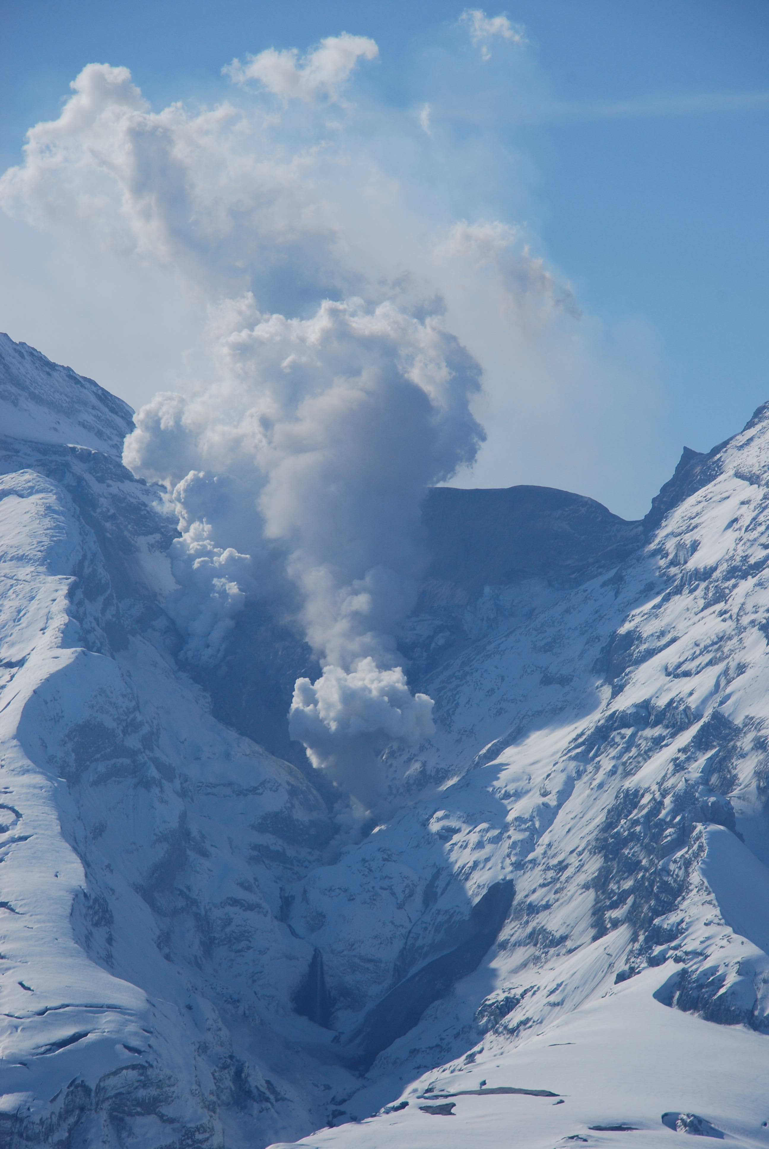 Rising rockfall-plume, seen from Redoubt's Hut. Heli-supported ...