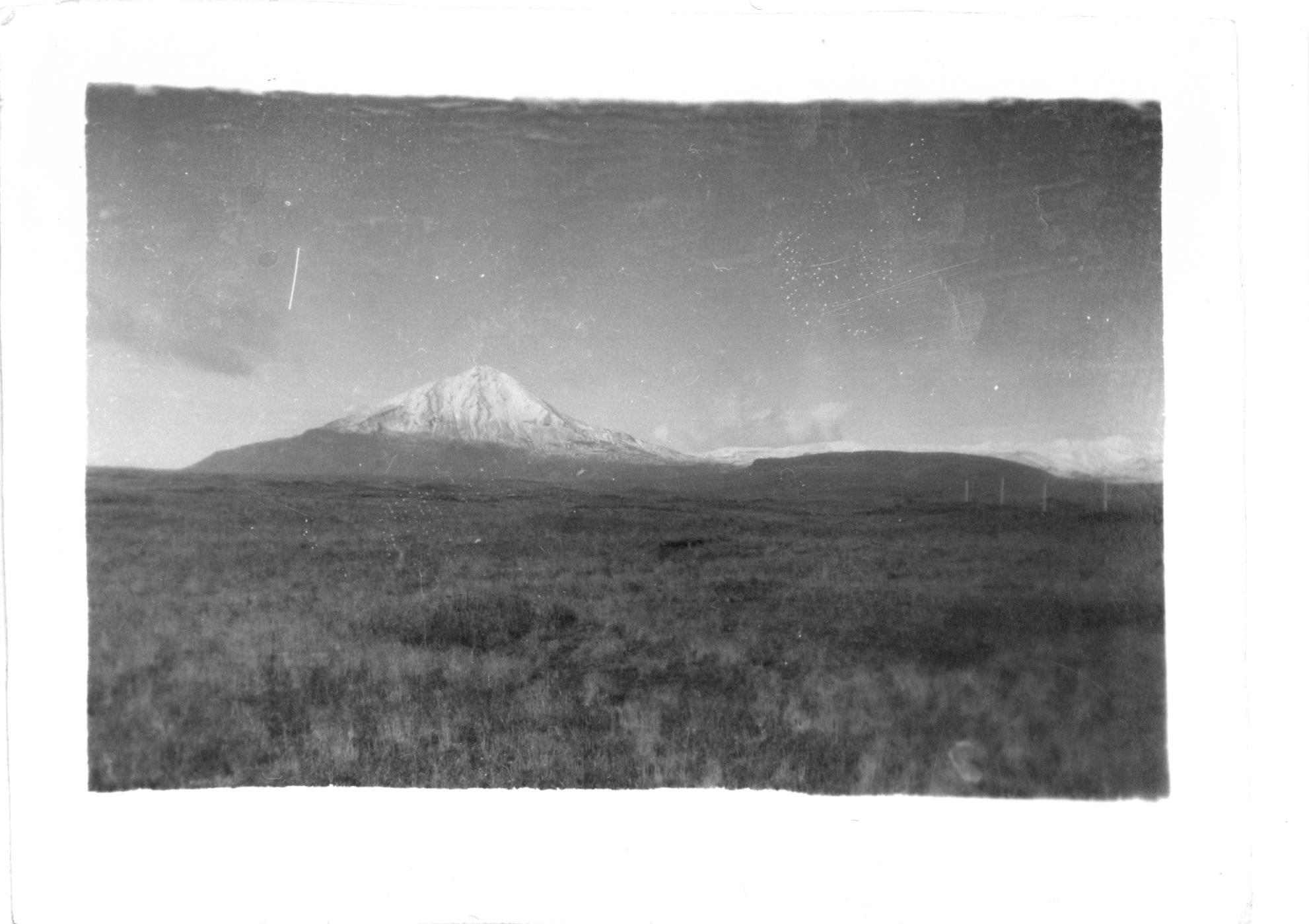 Photograph of Okmok volcano in eruption in June 1945, as viewed from ...