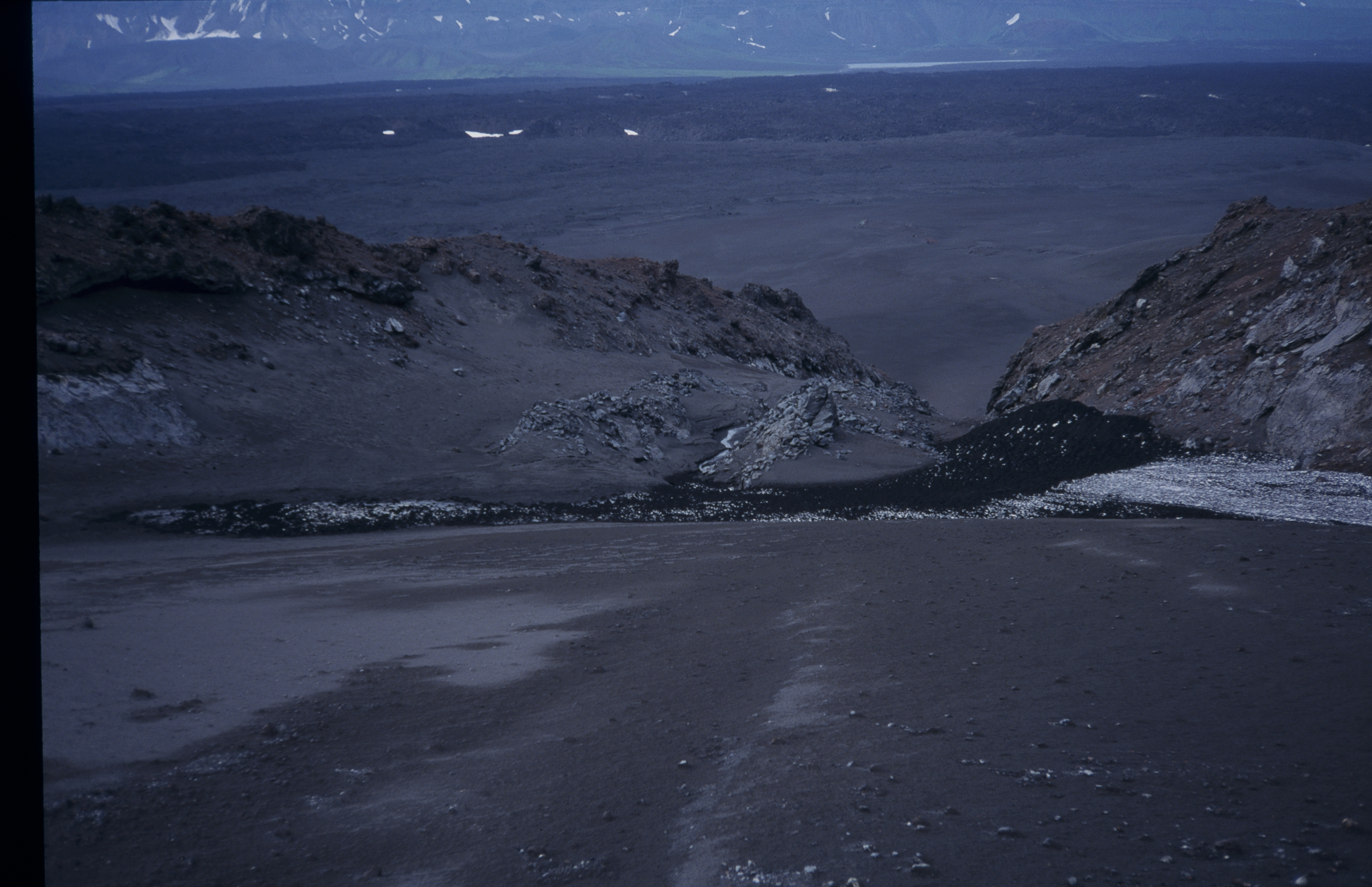 In this photo is a flow channel "chute" from Cone F on Okmok. Photo ...