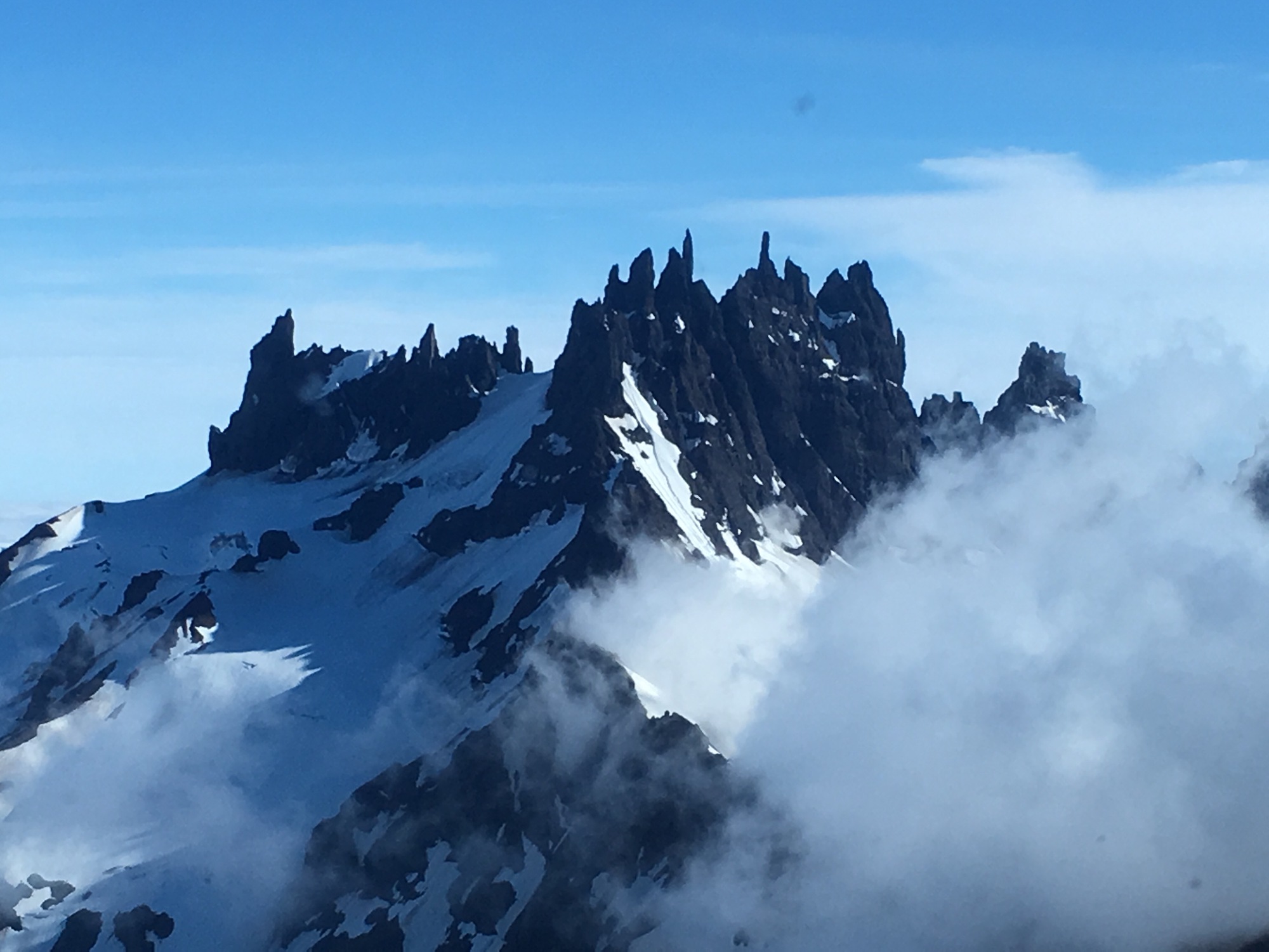 The Aghileen Pinnacles composed of old volcanic rocks, dikes, and sills ...
