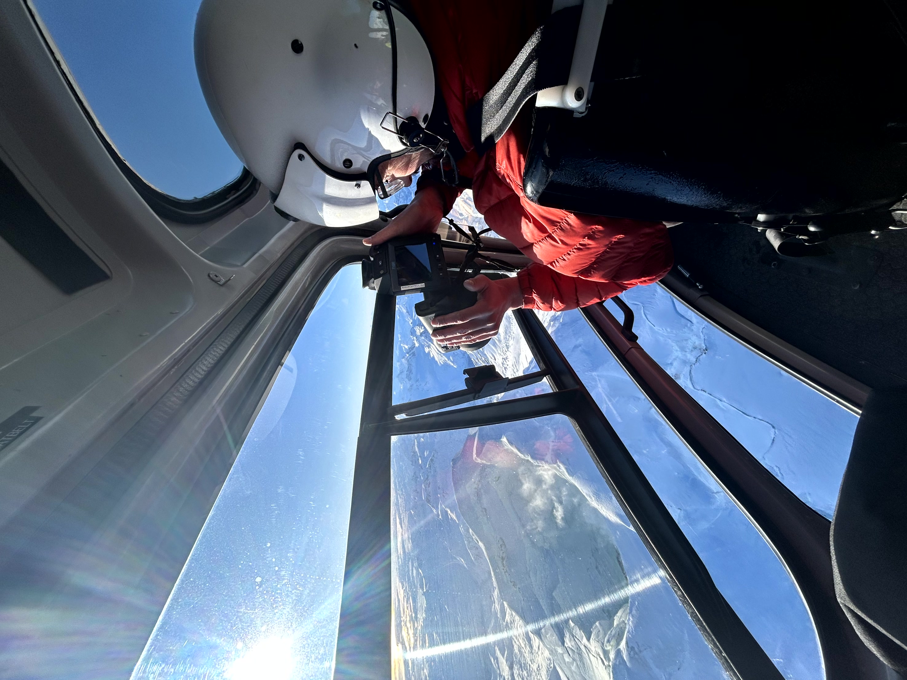 AVO Geologist Matt Loewen collecting thermal data at the summit of ...