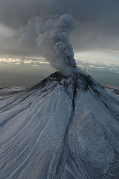 A steam and ash plume rises from the summit of Mt. Augustine in this ...
