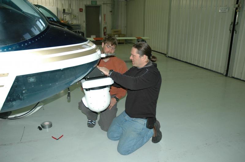 Rick Wessels and Tim Plucinski mounting the FLIR (Forward Looking ...