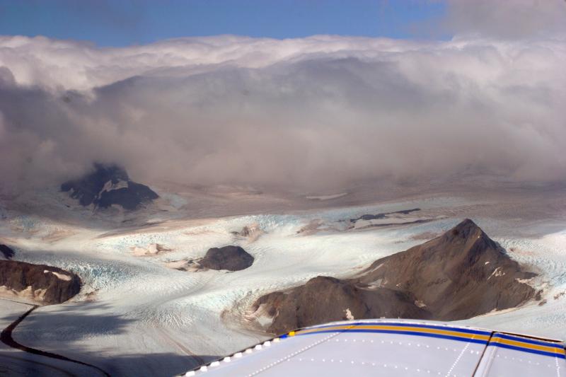 Continuous layer of discolored snow and ice above ~3,000 feet asl on ...