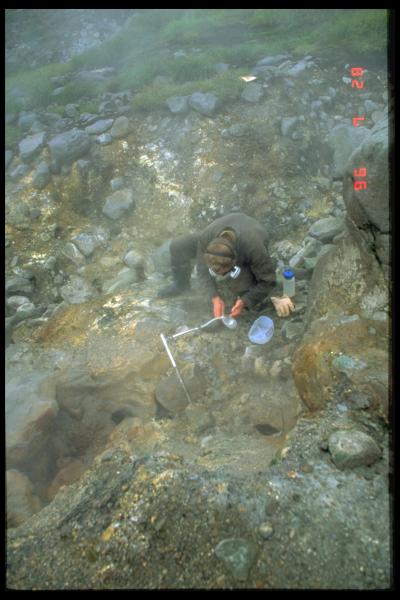 Bob Symonds collecting gas samples from fumaroles at the head of Hot ...