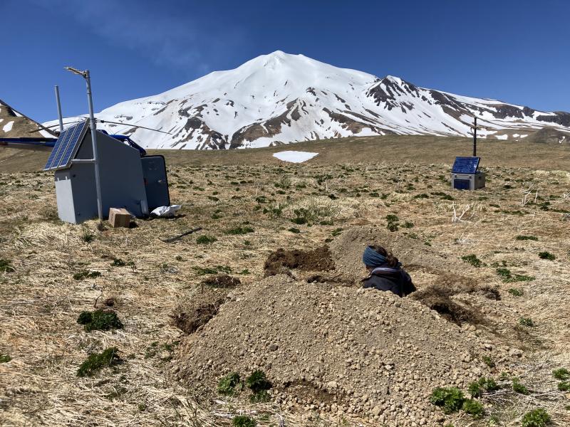 AVO field engineer Ellie Boyce replaces the seismometer at site GSMY ...