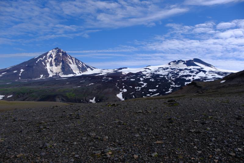 View of Pogromni Volcano (left) and Faris Peak (right) from the west ...